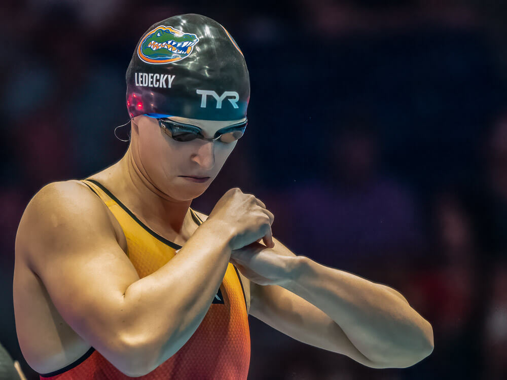 Katie Ledecky surges past McIntosh with record-breaking 400m freestyle ...