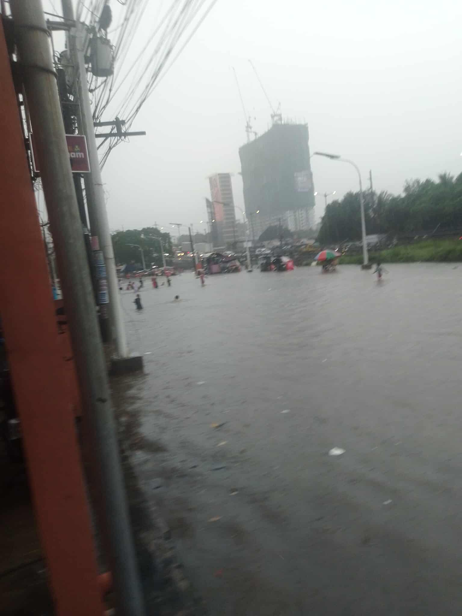 Heavy downpour turns QC roads into instant waterways, more rains loom